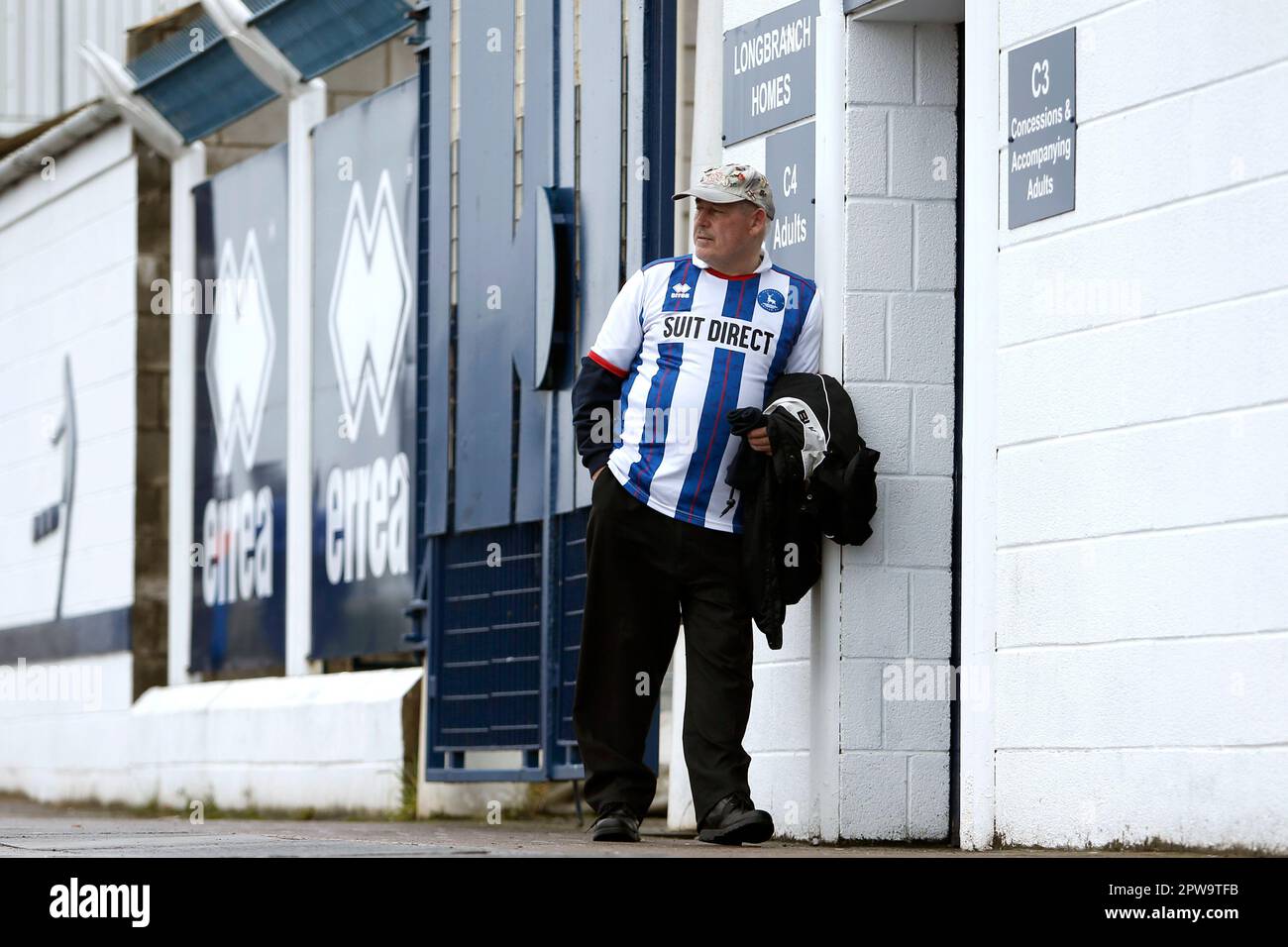 A Hartlepool United fan waits for the turnstiles to open ahead of the ...