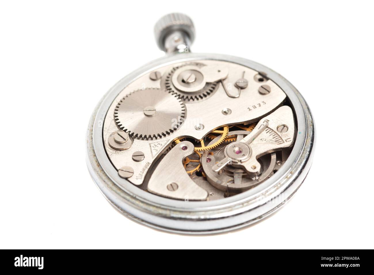 Mechanism, clockwork of a stopwatch, isolated on white. Time, work ...