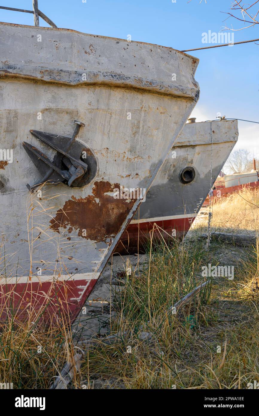 View of the bow of an old rusty fishing vessel pulled ashore Stock ...