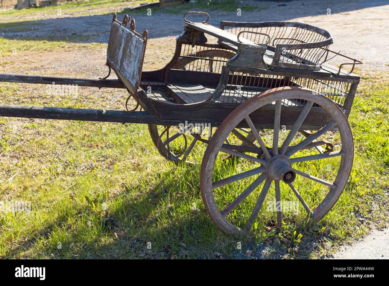 Old wooden two wheeled horse wagon used for transportation of goods and ...