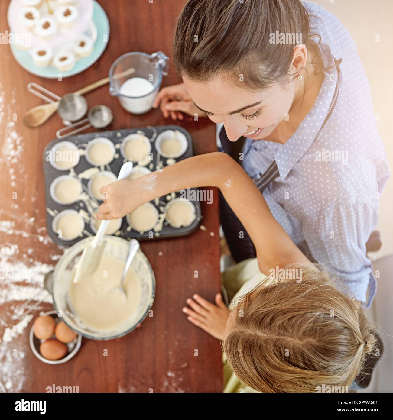 Youre my little baking star. a mother and her daughter baking in the ...