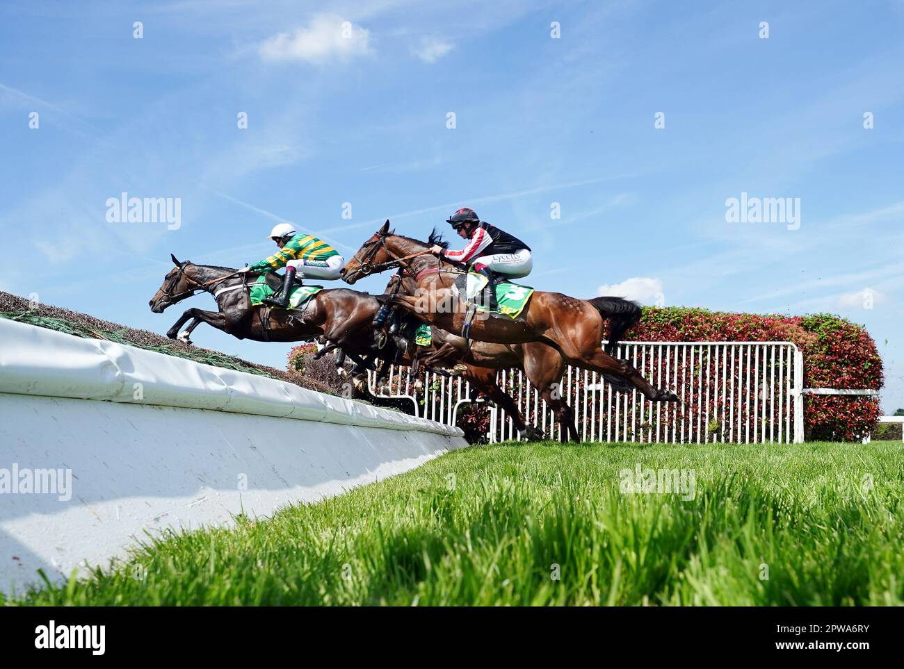 Jonbon ridden by jockey Aidan Coleman clear a fence on their way to ...