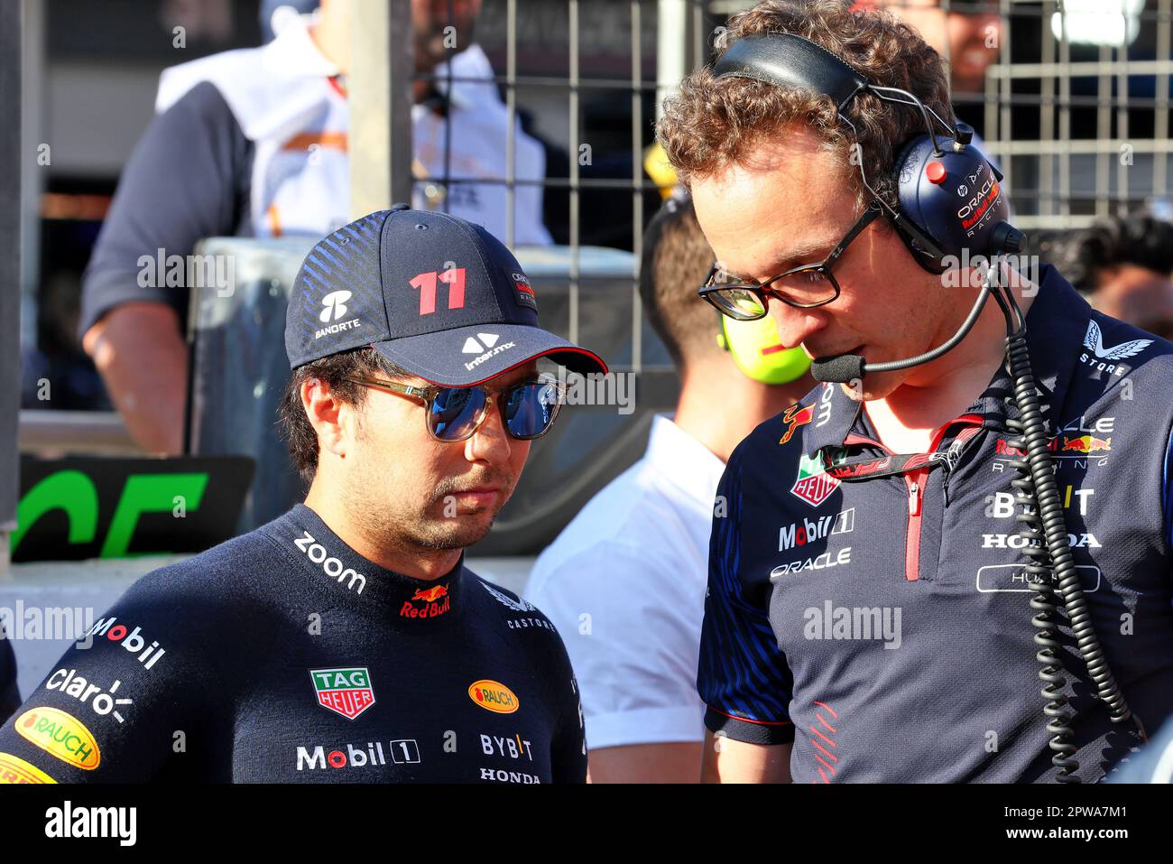Baku, Azerbaijan. 29th Apr, 2023. (L to R): Sergio Perez (MEX) Red Bull Racing with Hugh Bird ...