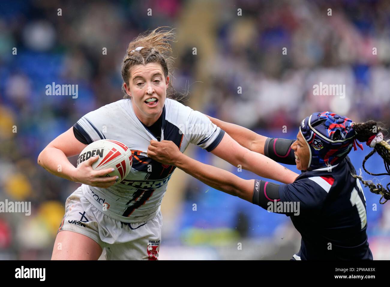 Vicky Molyneux #17 of England hands off Elisa Akpa #11 of France during ...