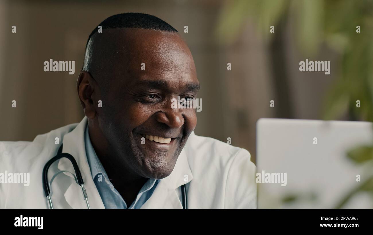 African doctor psychotherapist middle aged hi-res stock photography and ...