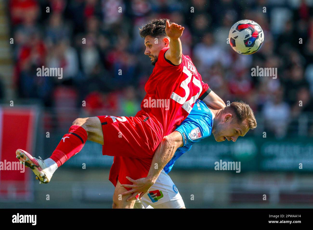 Leyton Orient's Rob Hunt (left) with Stockport County's Chris Hussey ...
