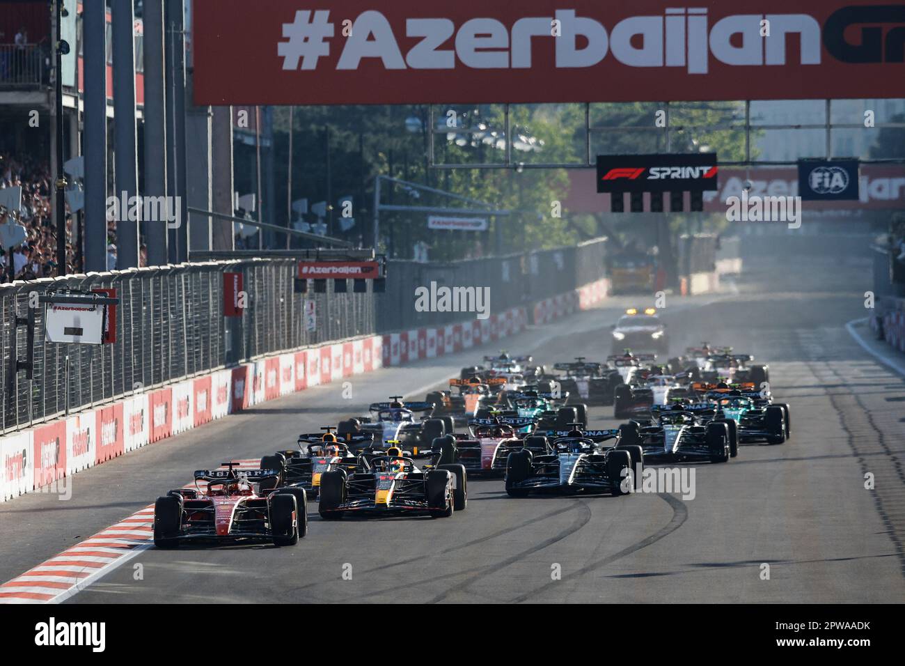 16 LECLERC Charles (mco), Scuderia Ferrari SF-23, action leading the Sprint start of the race ...