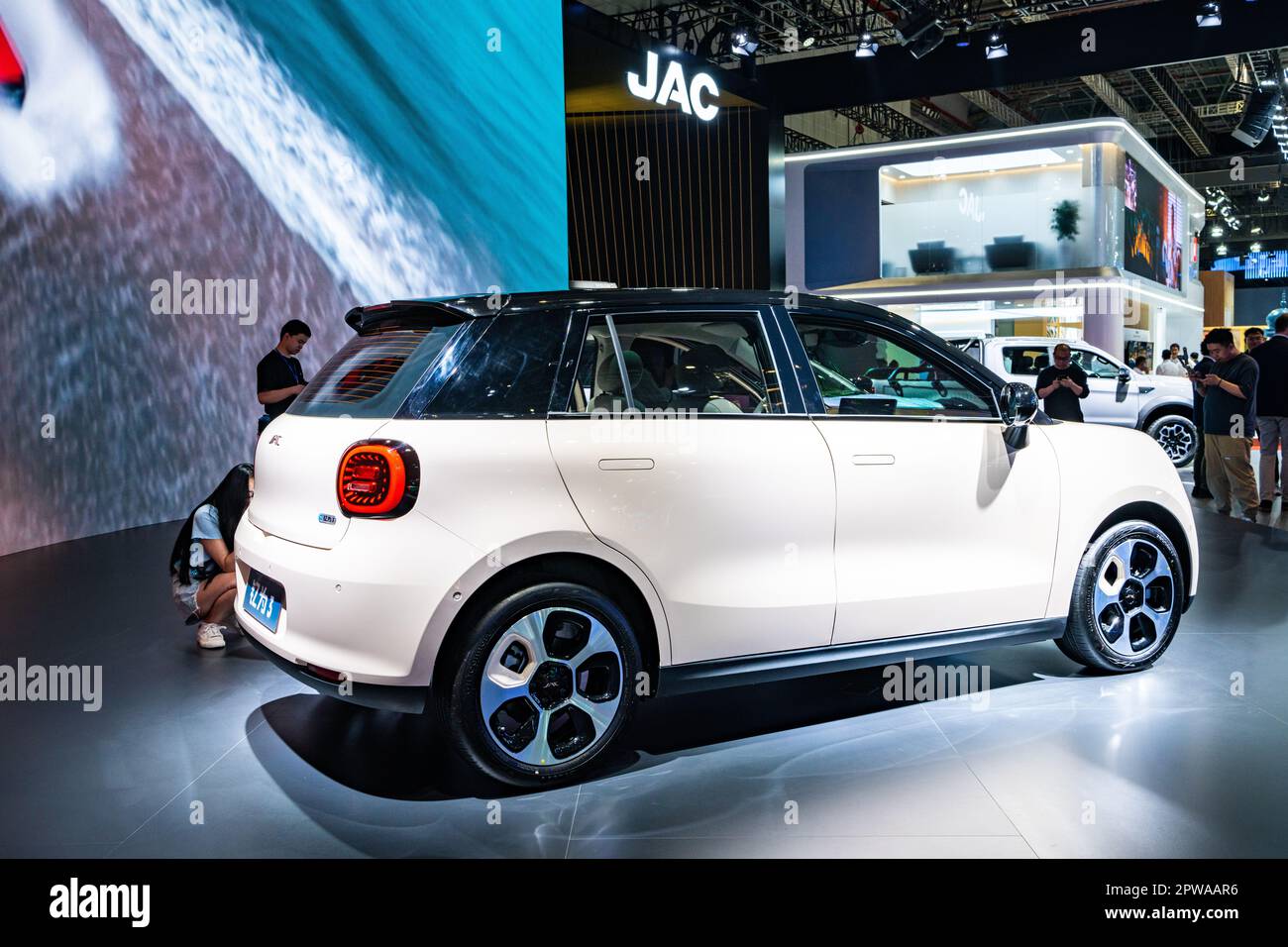 JAC Yiwei 3, exported as E30X, a small electric hatchback on display at ...