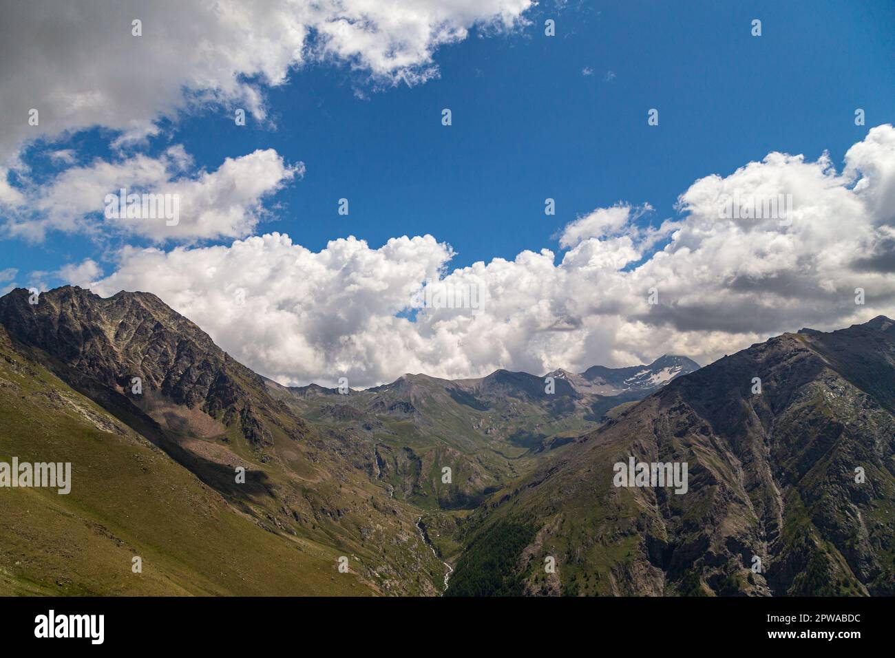 The beautiful valley in front of the Gran Paradiso in a summer day ...