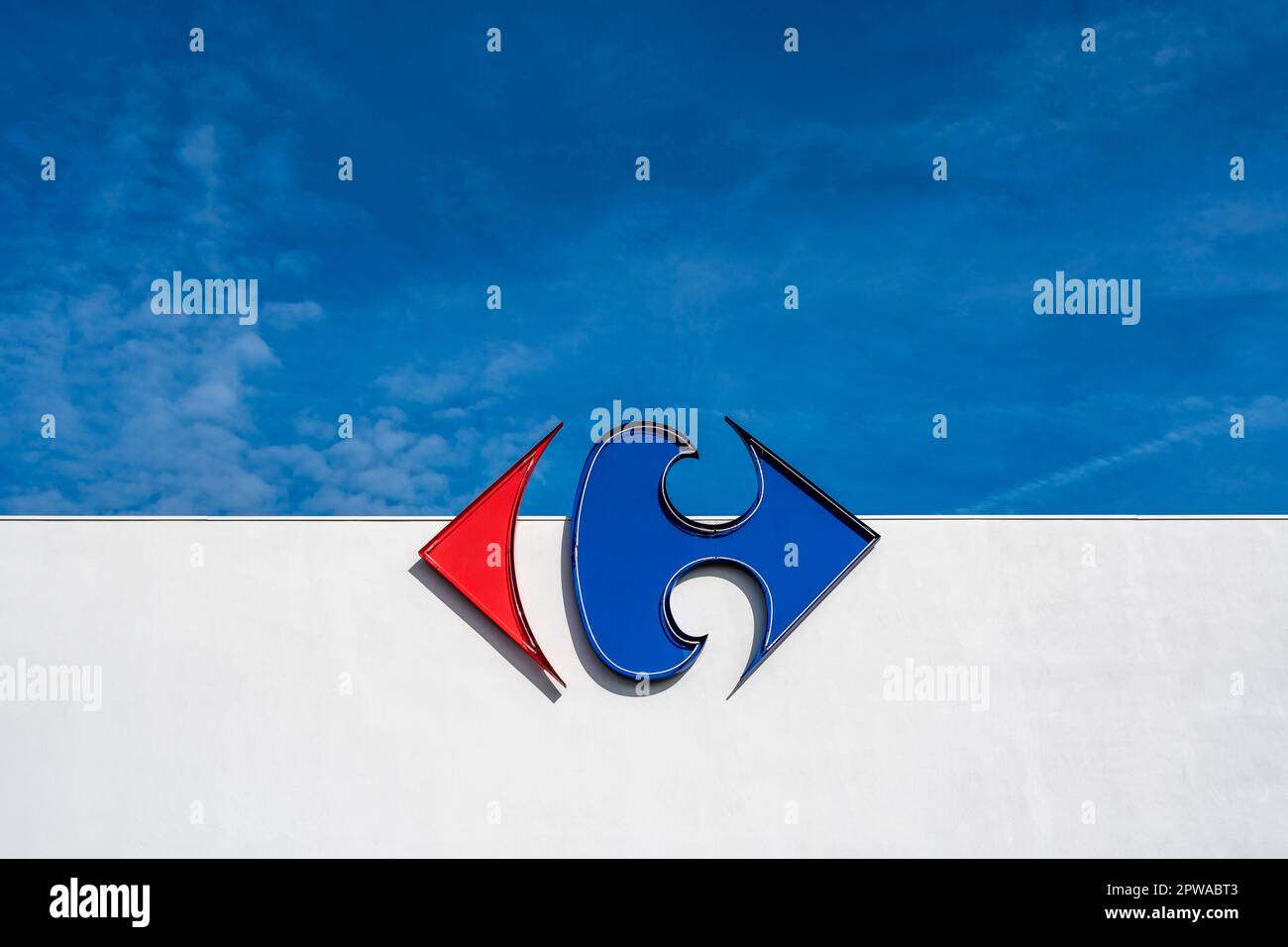 Anglet, France - April 26, 2023: Logo of the Carrefour group on a white ...