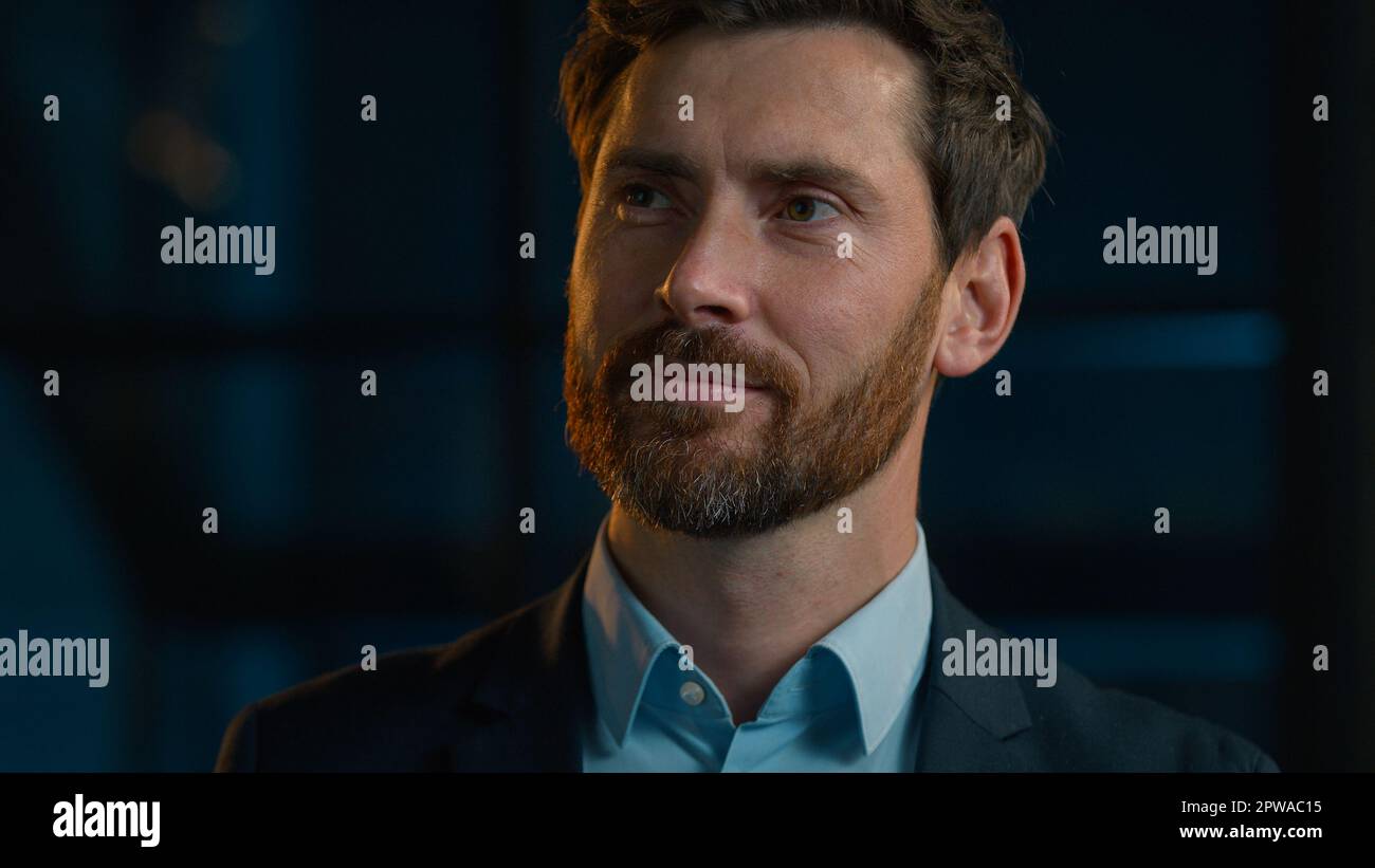 Thoughtful dreamy millennial caucasian man look at distance with smile ...