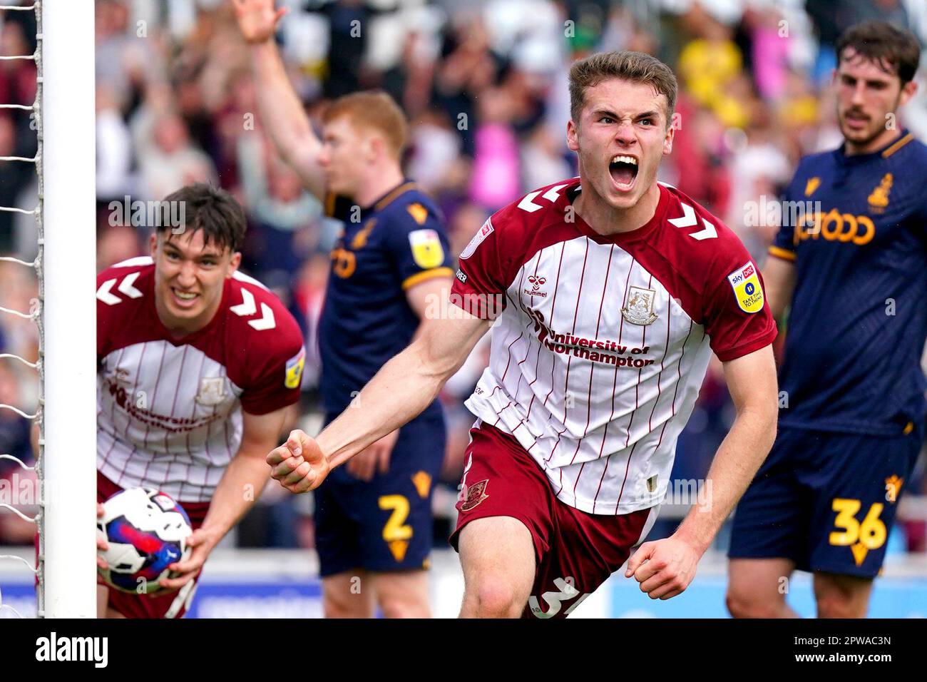 Northampton Town's Max Dyche celebrates scoring their side's first goal ...
