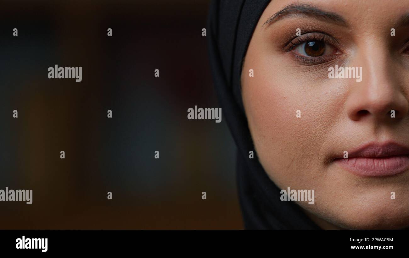 Serious female half face arabian muslim turkish woman in traditional ...