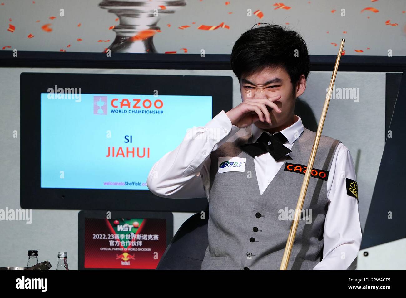 Si Jiahui reacts during his match against Luca Brecel (not pictured) on day fifteen of the Cazoo ...