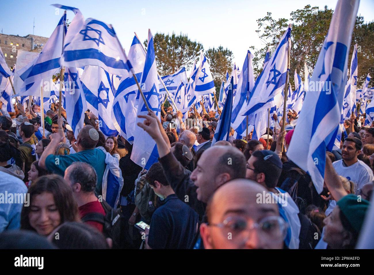 Reform supporters gather and wave the Israeli flags during a pro ...