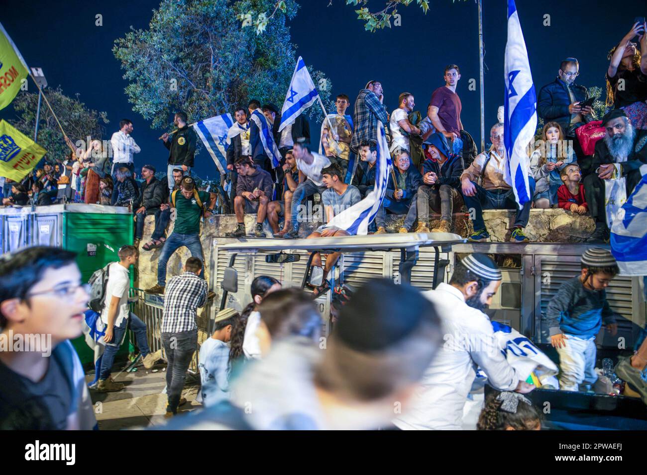 Reform supporters looks over at the crowd during a pro-reform protest ...