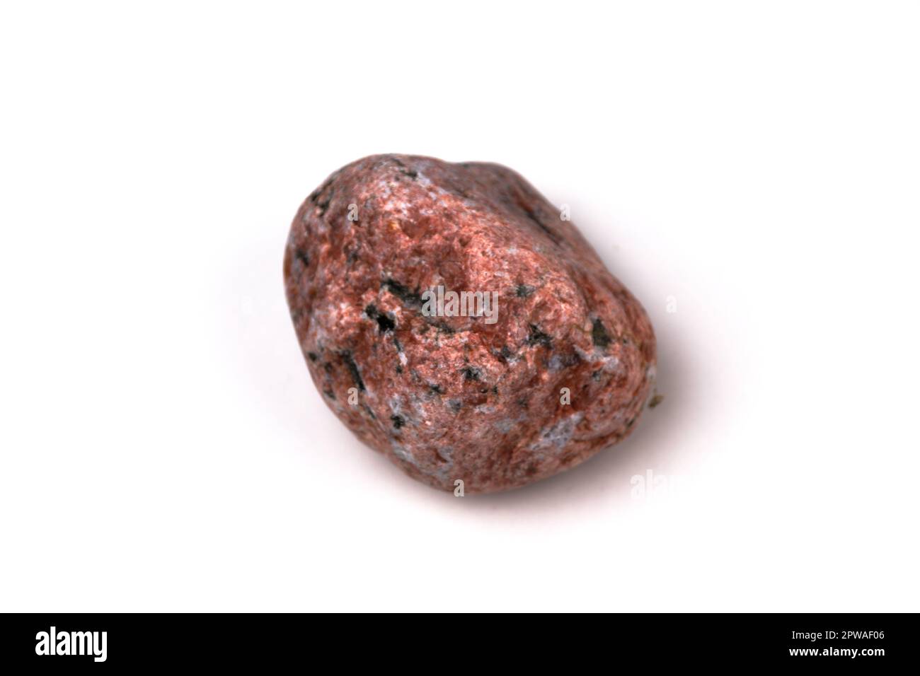 single red stone isolated on white background Stock Photo - Alamy