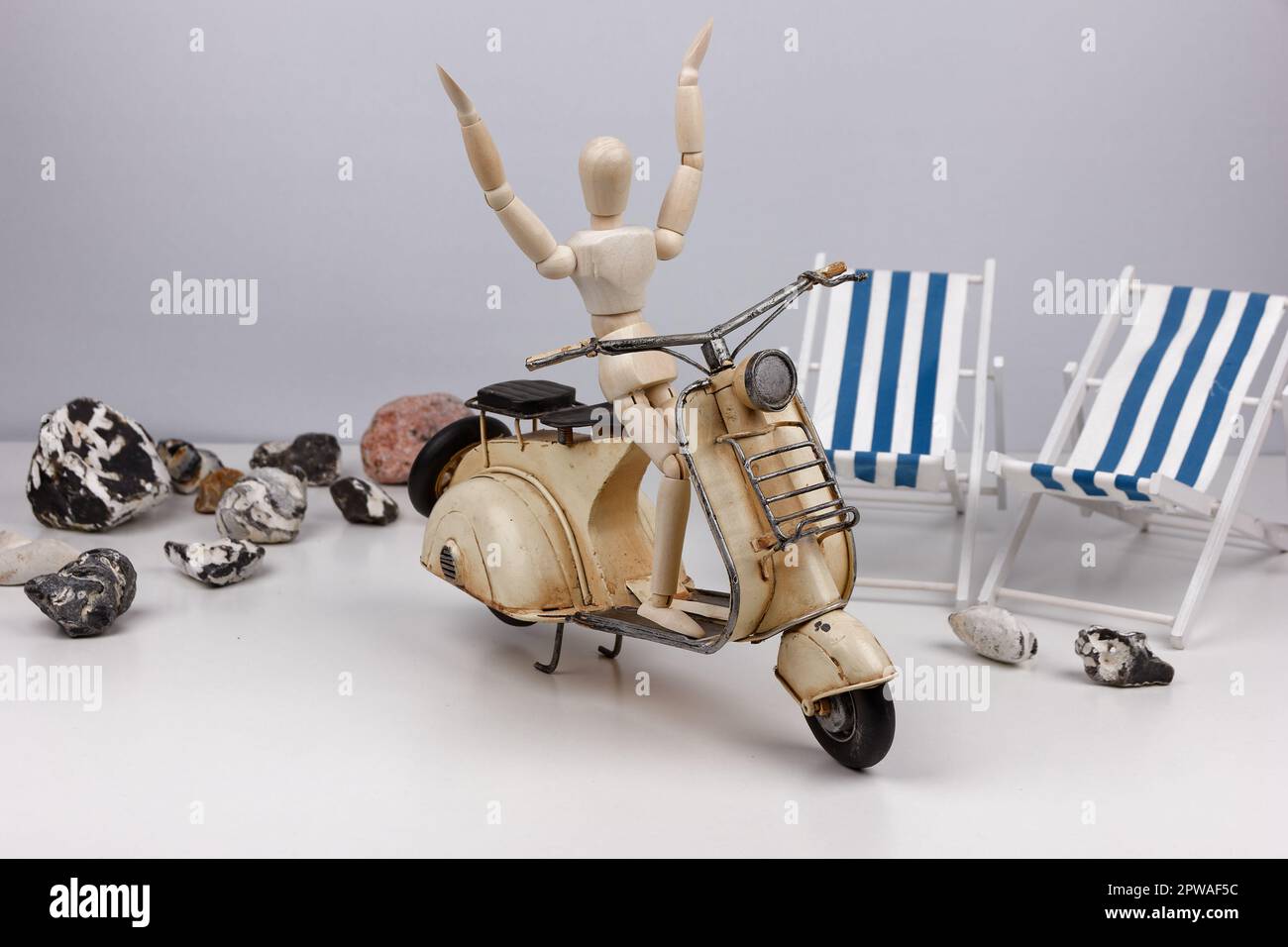detailed view of a motor scooter model combined with a puppet on a ...