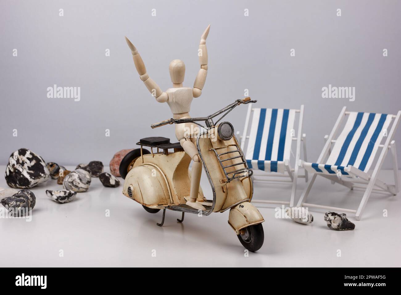 detailed view of a motor scooter model combined with a puppet on a ...