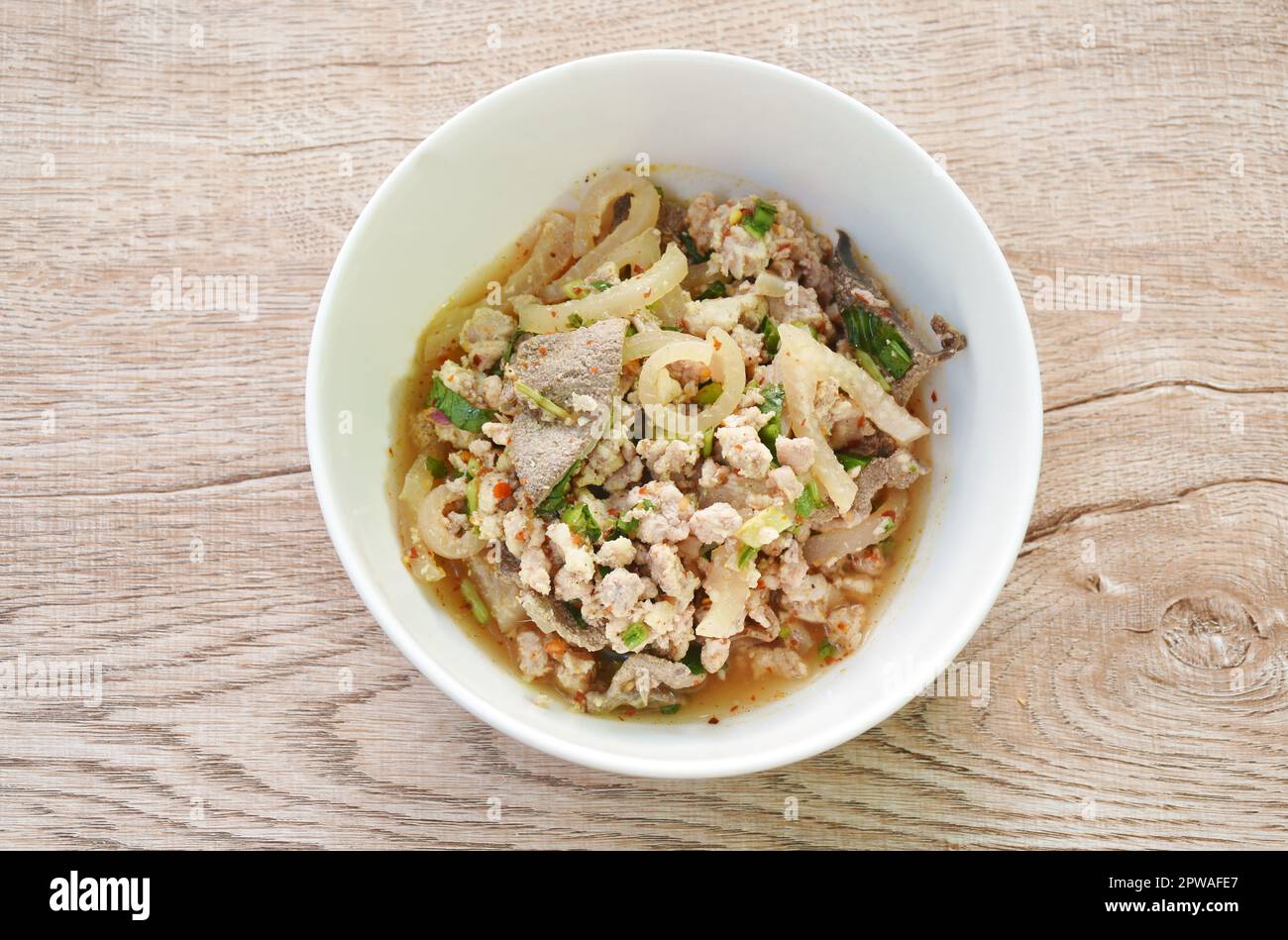 Thai spicy chop pork and slice skin with liver salad on bowl Stock ...