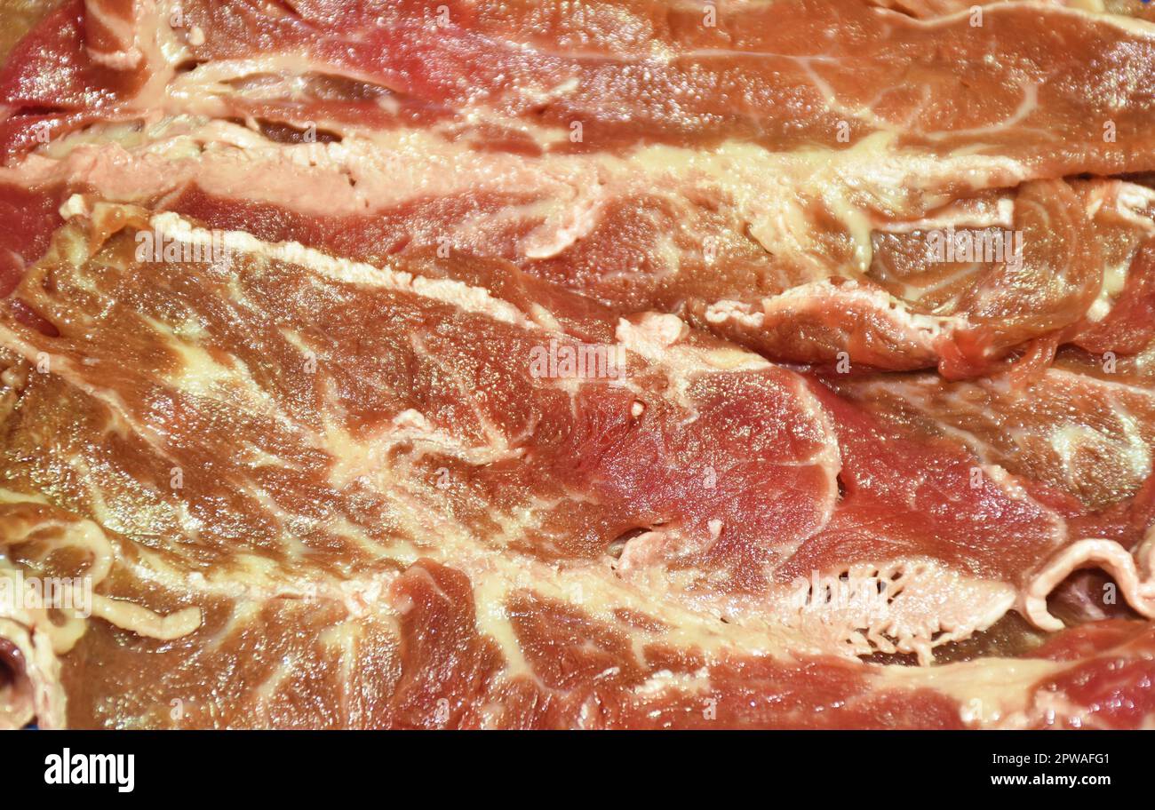 slice beef shank raw food arranging on plate isolated in white ...