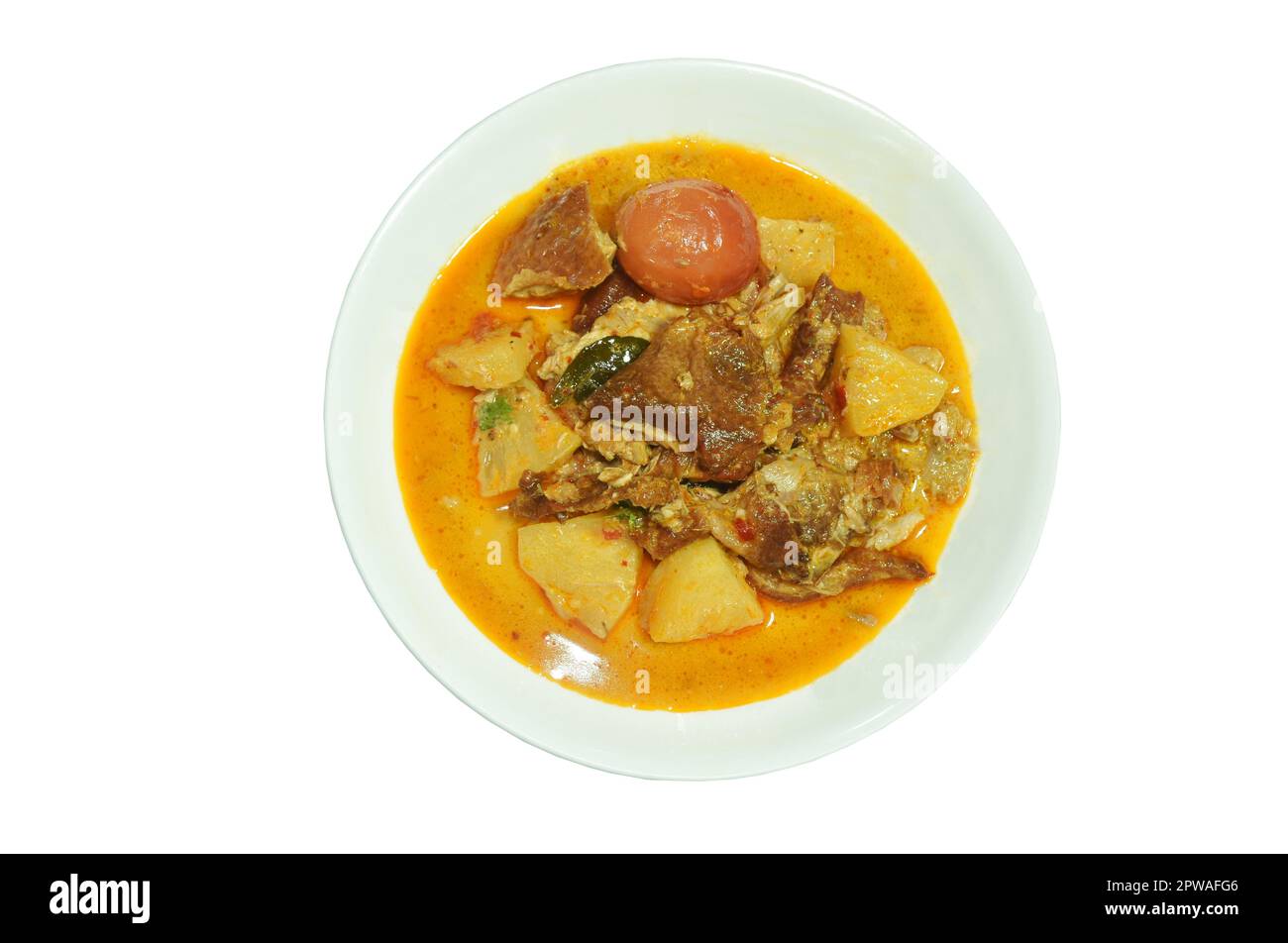 spicy boiled roasted duck meat with pineapple and tomato in coconut ...
