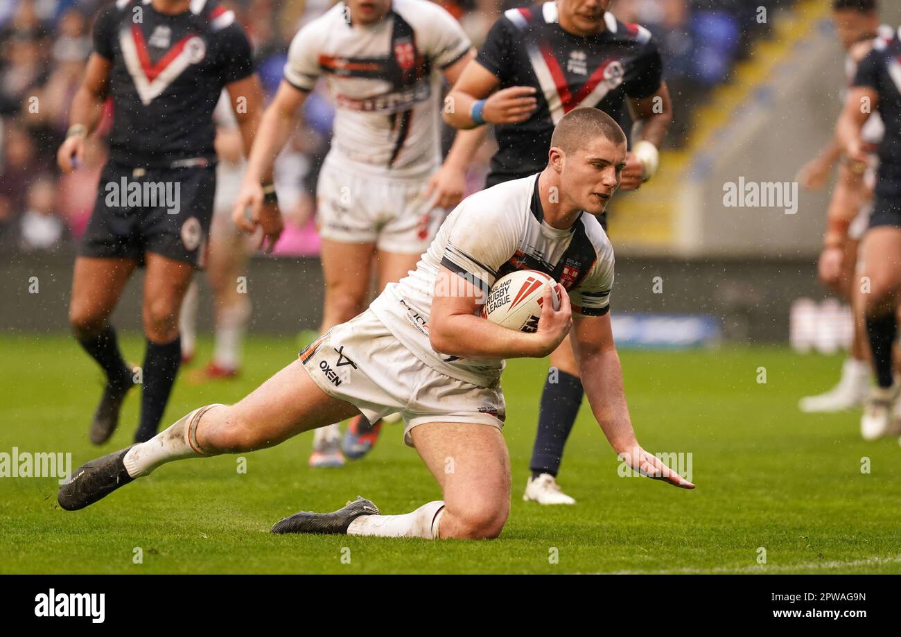 England's Tom Holroyd scores a try during the men's mid-season ...