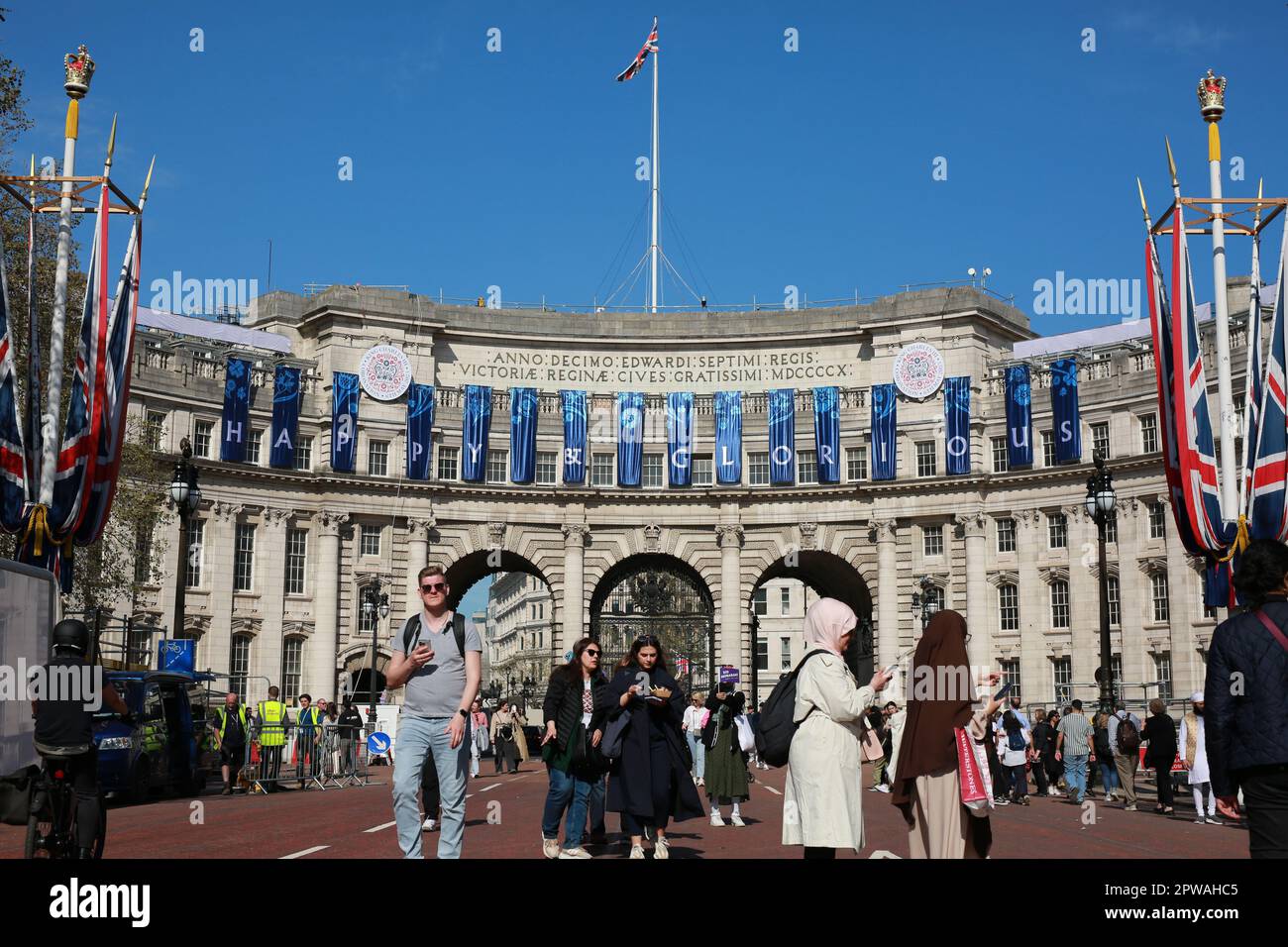 London, UK. 29 April 2023. The words Happy & Glorious are being put up ...