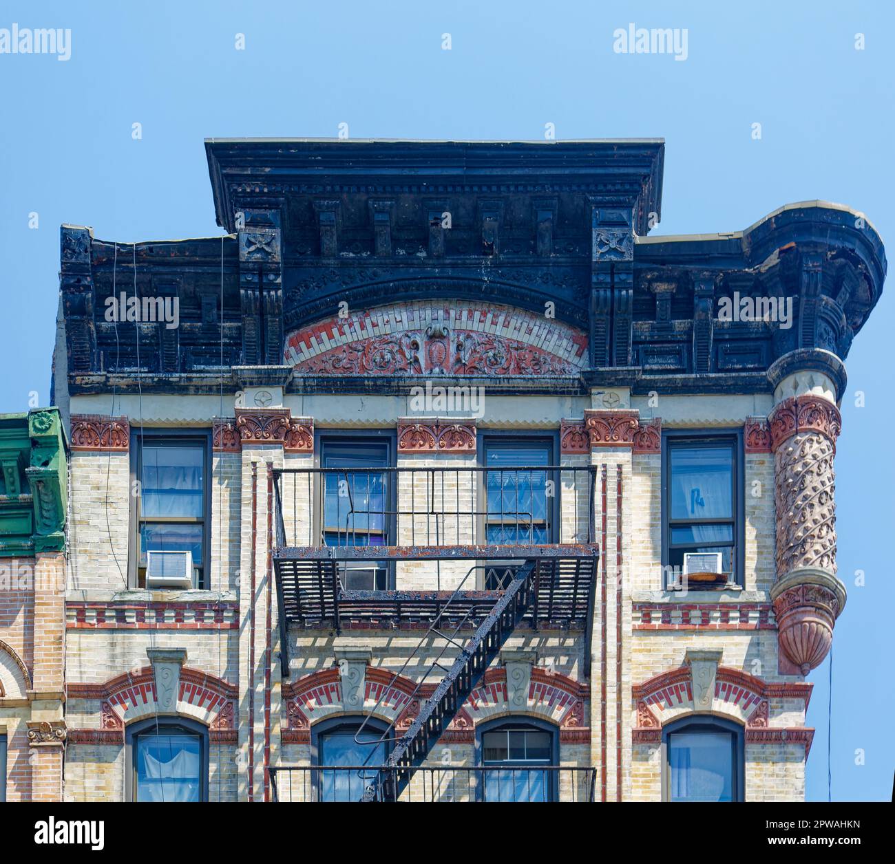 225 Madison Street is an impressive brick apartment house with stone ...