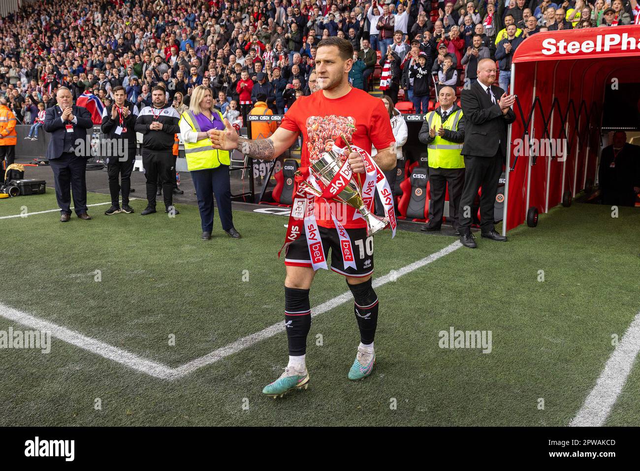 Sheffield United's Billy Sharp holding the second place trophy after ...