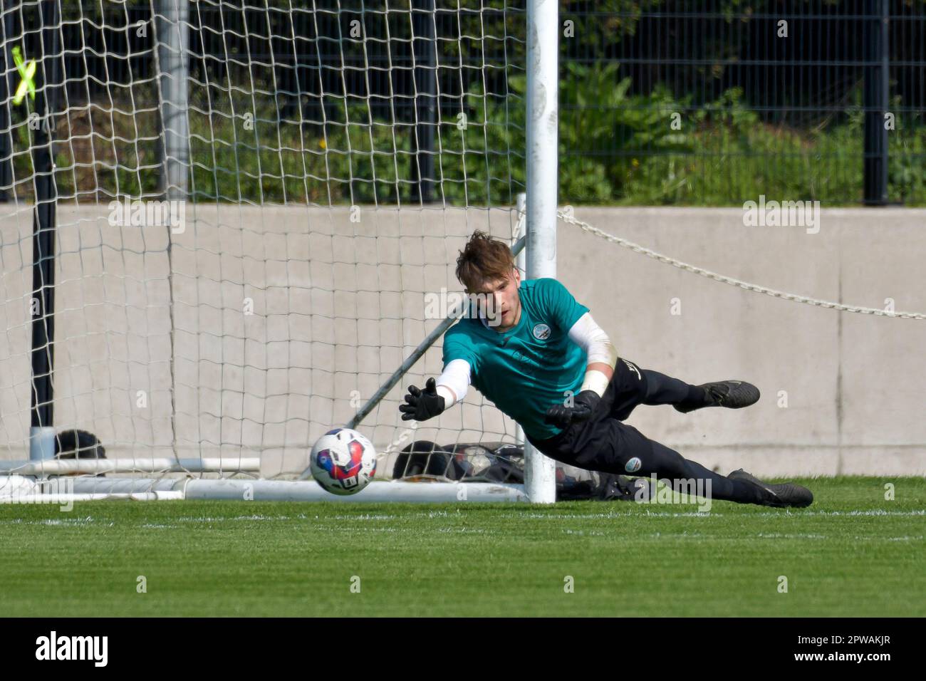 Swansea, Wales. 29 April 2023. Goalkeeper Ewan Griffiths of Swansea ...