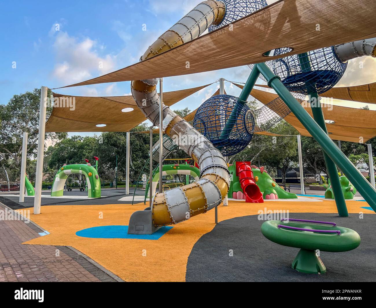 View of children's playground with slides Stock Photo - Alamy