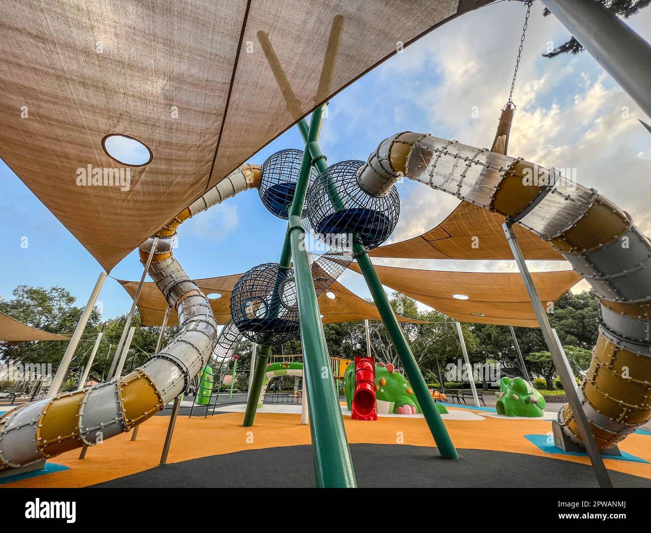 View of children's playground with slides Stock Photo - Alamy