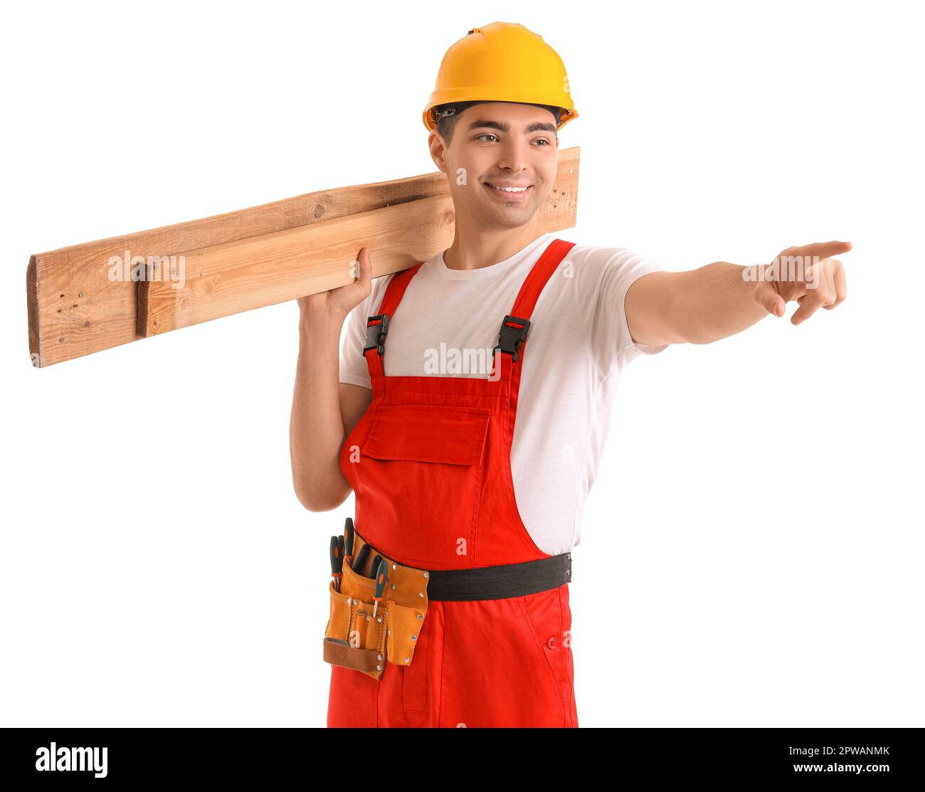 Young carpenter with wooden planks pointing at something on white ...