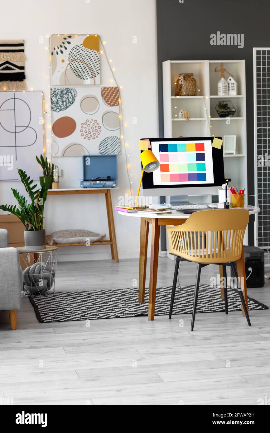 Graphic designer's workplace with computer in interior of office Stock ...
