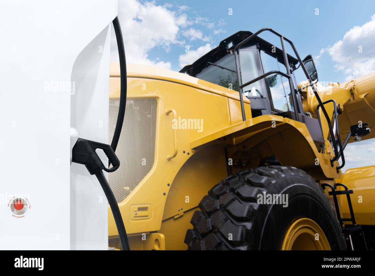 Electric construction machines with charging station. Concept Stock ...