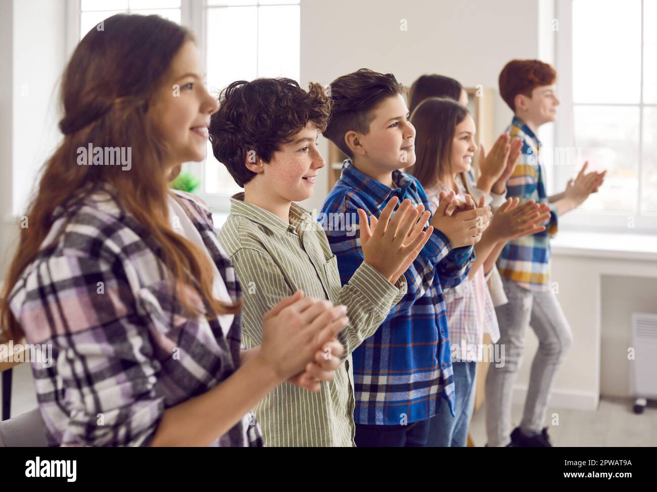 Audience Of Children Clapping