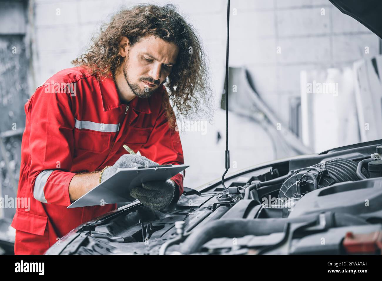 Mechanic male team staff worker working with car problem engine auto ...