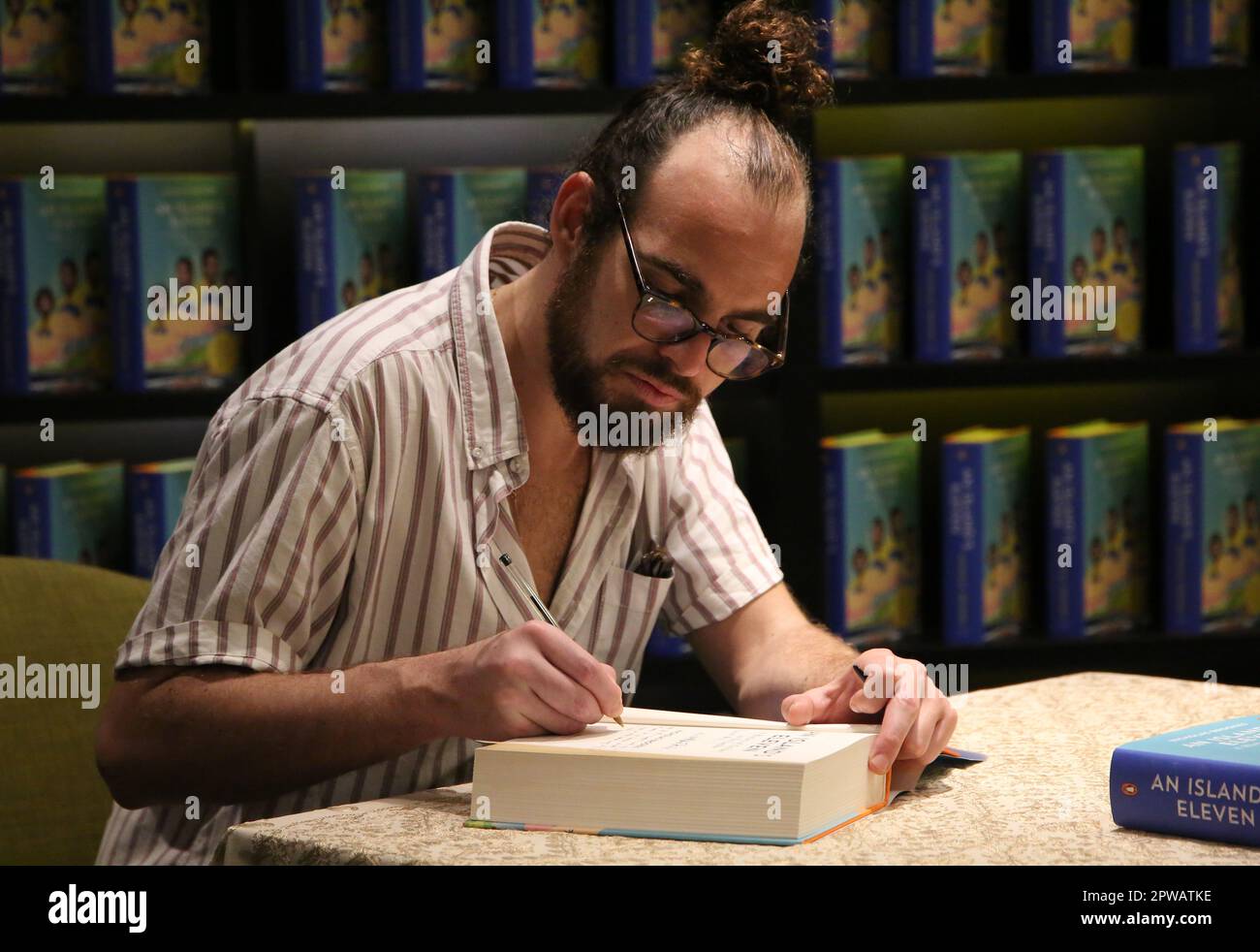 Author Nicholas Brooks was photographed at a book signing event in ...