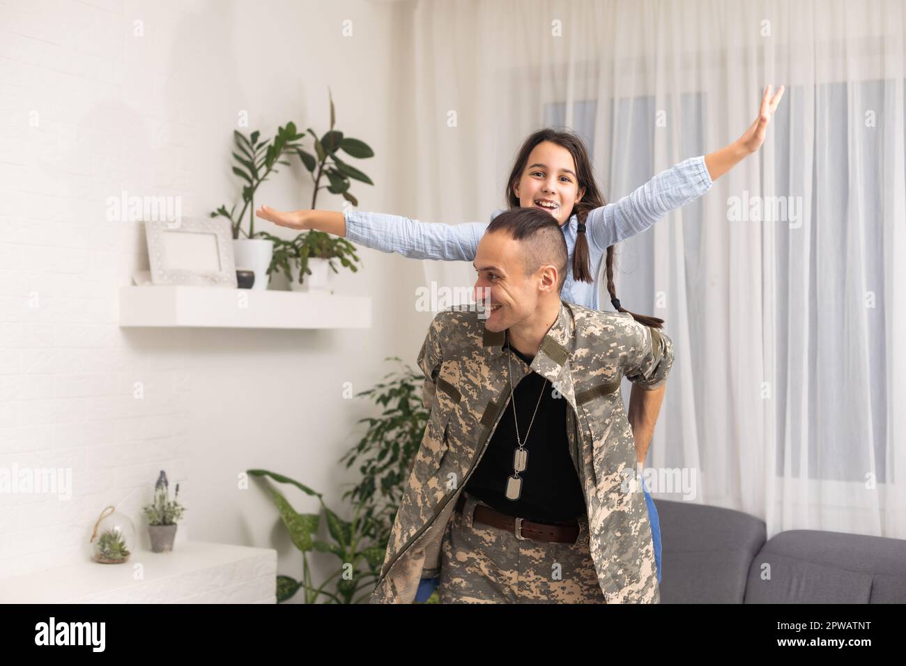 military father hugging his daughter Stock Photo - Alamy
