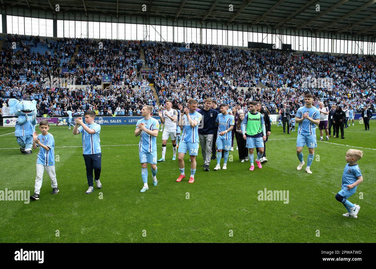 Coventry City players applaud the fans as they walk around the pitch ...