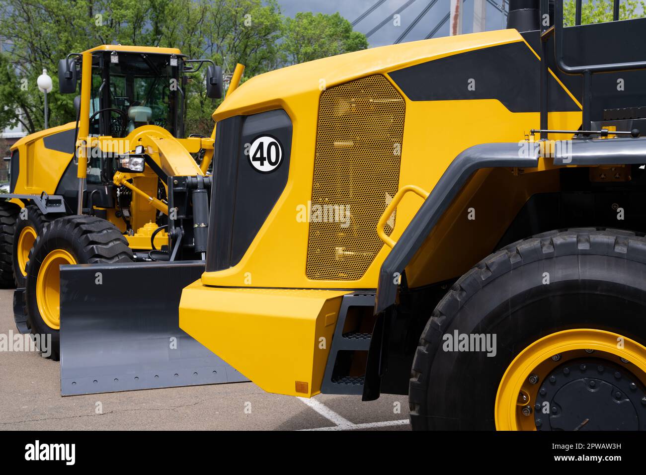 Fleet of yellow construction machines. High quality photo Stock Photo ...