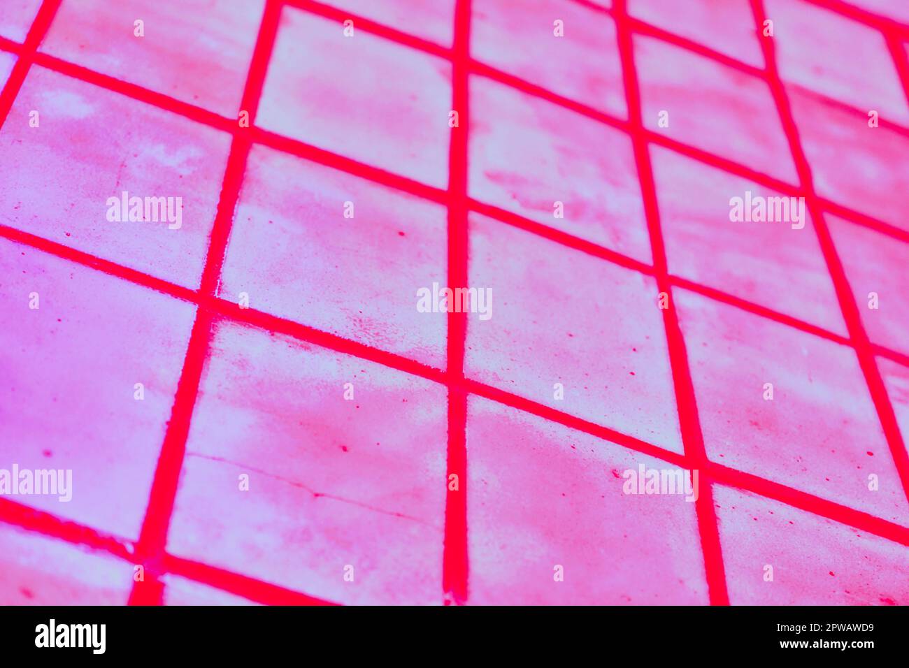 Red pink checkered tiled abstract background wall Stock Photo - Alamy