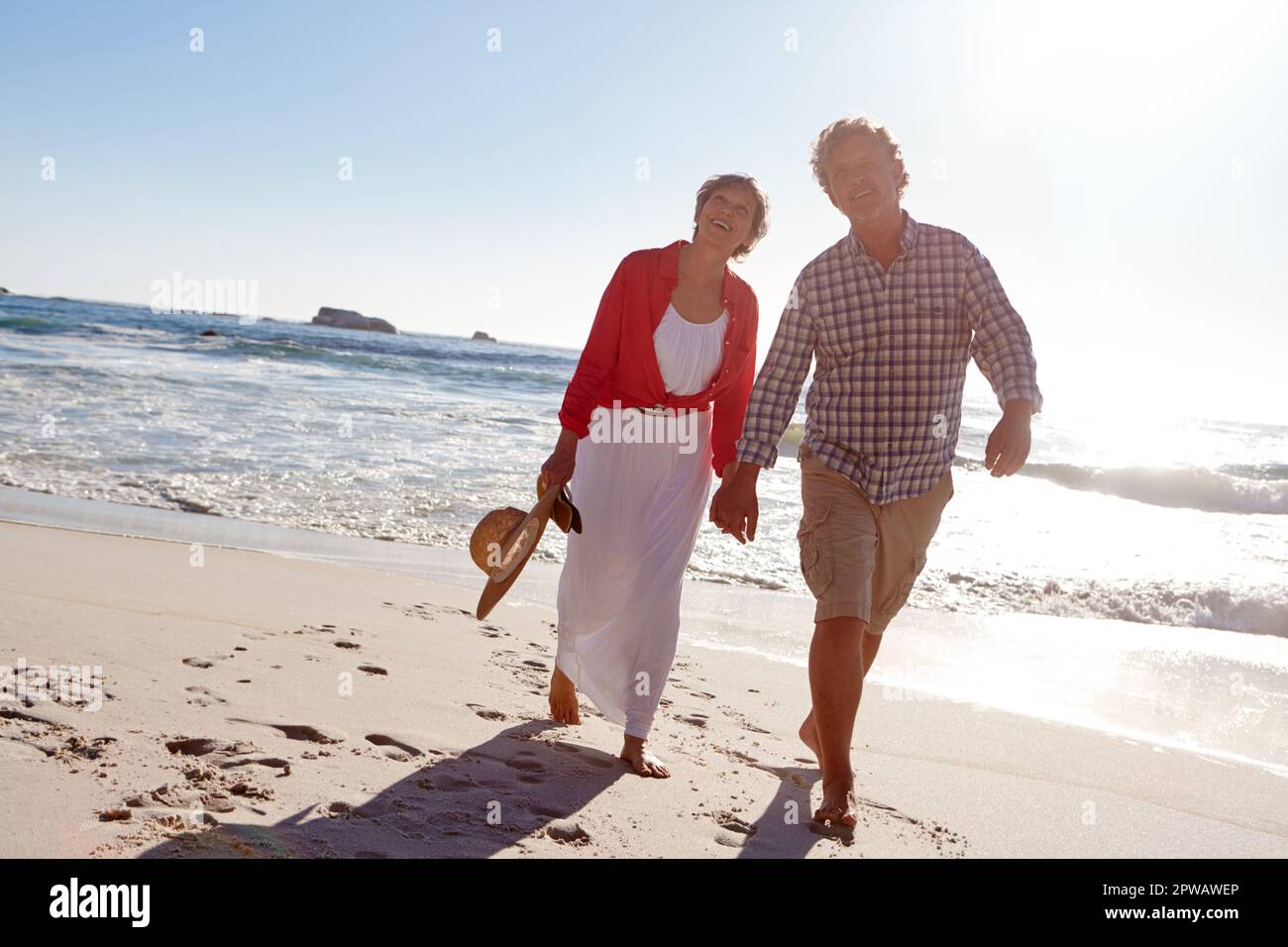 Walking through life hand in hand. a mature couple enjoying a late ...