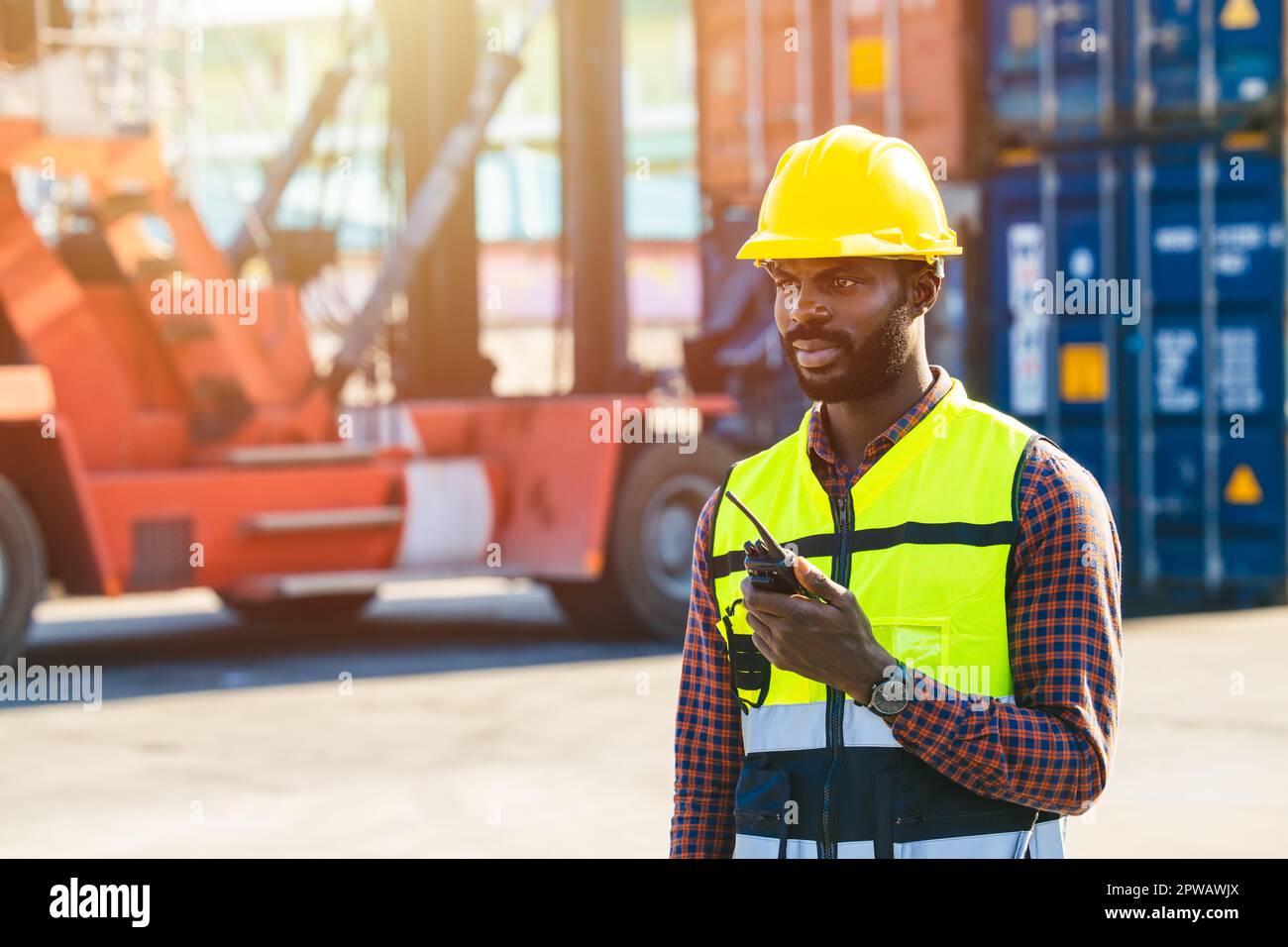 Logistic Worker Black Male Working In Port Cargo Container Yard Operate Manage Loading Control