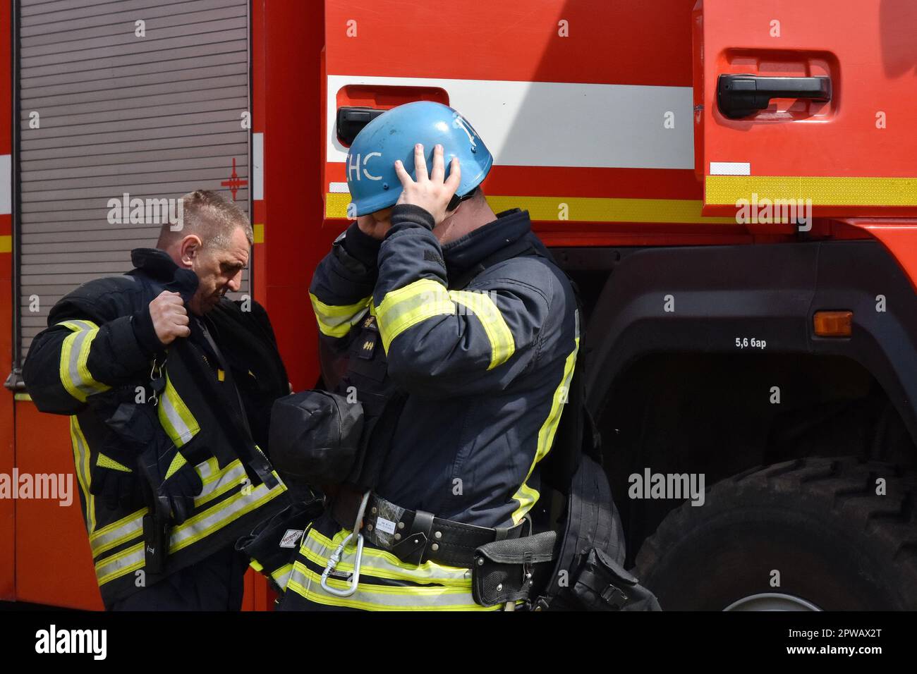 Members of the Ukrainian State Emergency Service seen after the end of ...