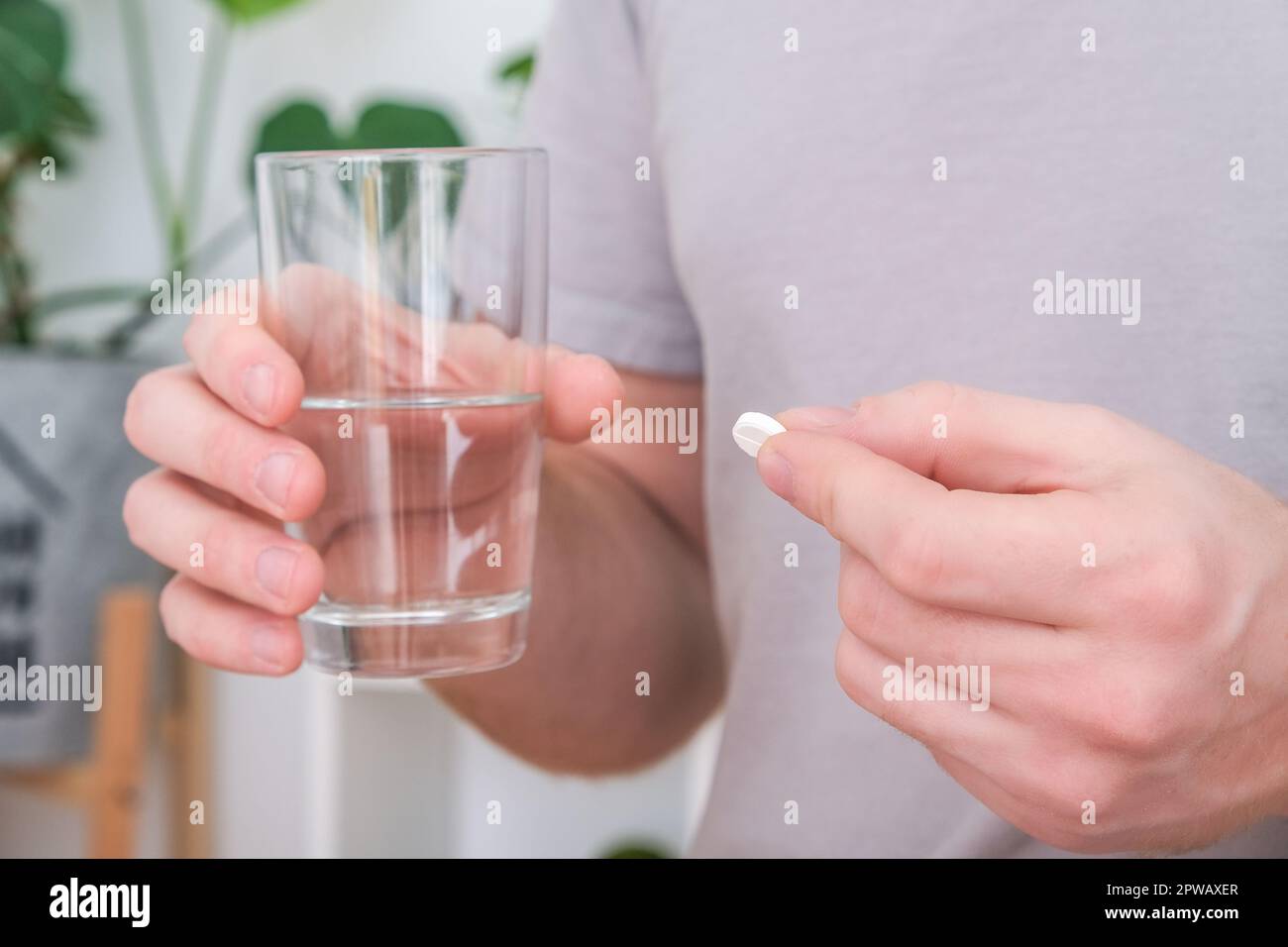 Young old man drinking water glass hi-res stock photography and images ...