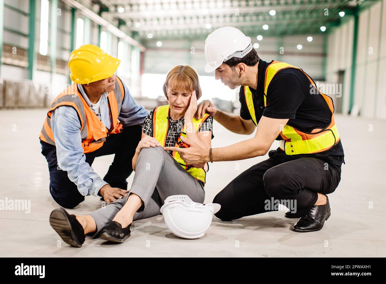 senior female engineer faints sick health problem accident at workplace ...