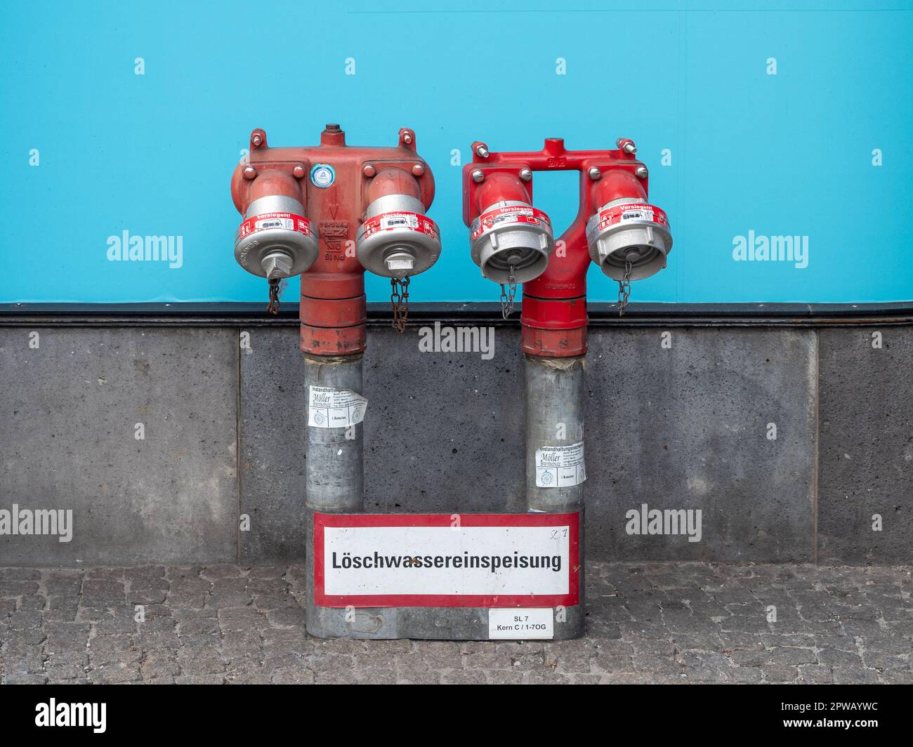 Fire hydrant and the walls of the building. Fire hydrant close-up Stock ...