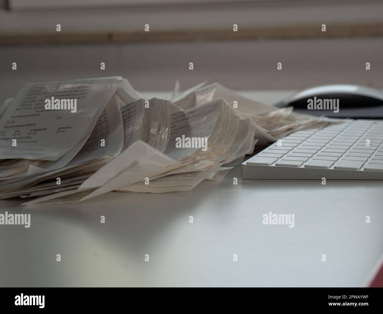 Paper cash receipts in a stack of tickets. Close-up of cash receipts ...